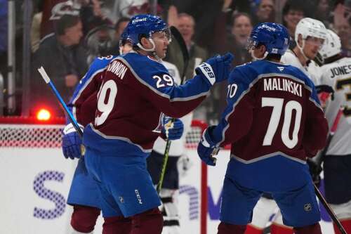Nathan MacKinnon leads a balanced scoring attack as Avalanche cruise to ...