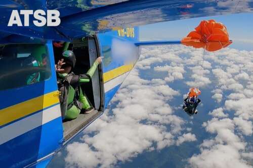 Skydiver dangles at 15,000 feet after parachute catches on plane's tail ...