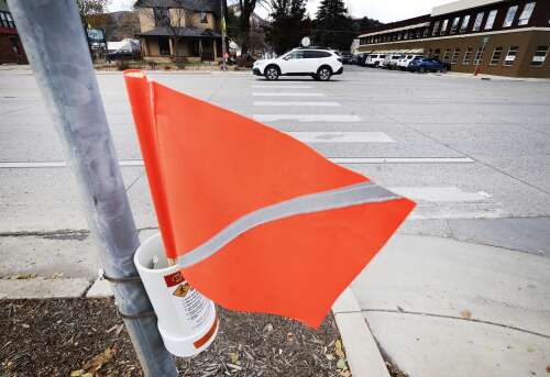 Durango tests neon pedestrian flags at crossing frequented by children ...