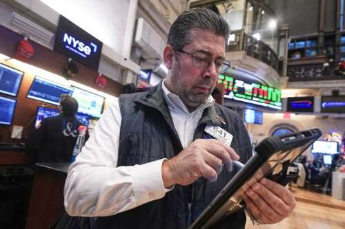 Wall Street ticks lower ahead of call by a divided Federal Reserve ...