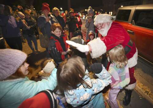 Photo: Santa arrives in a Ford Bronco to sing Christmas carols and ...