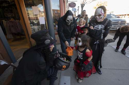 Photos: Costumed creatures crave the candy in downtown Durango - The ...